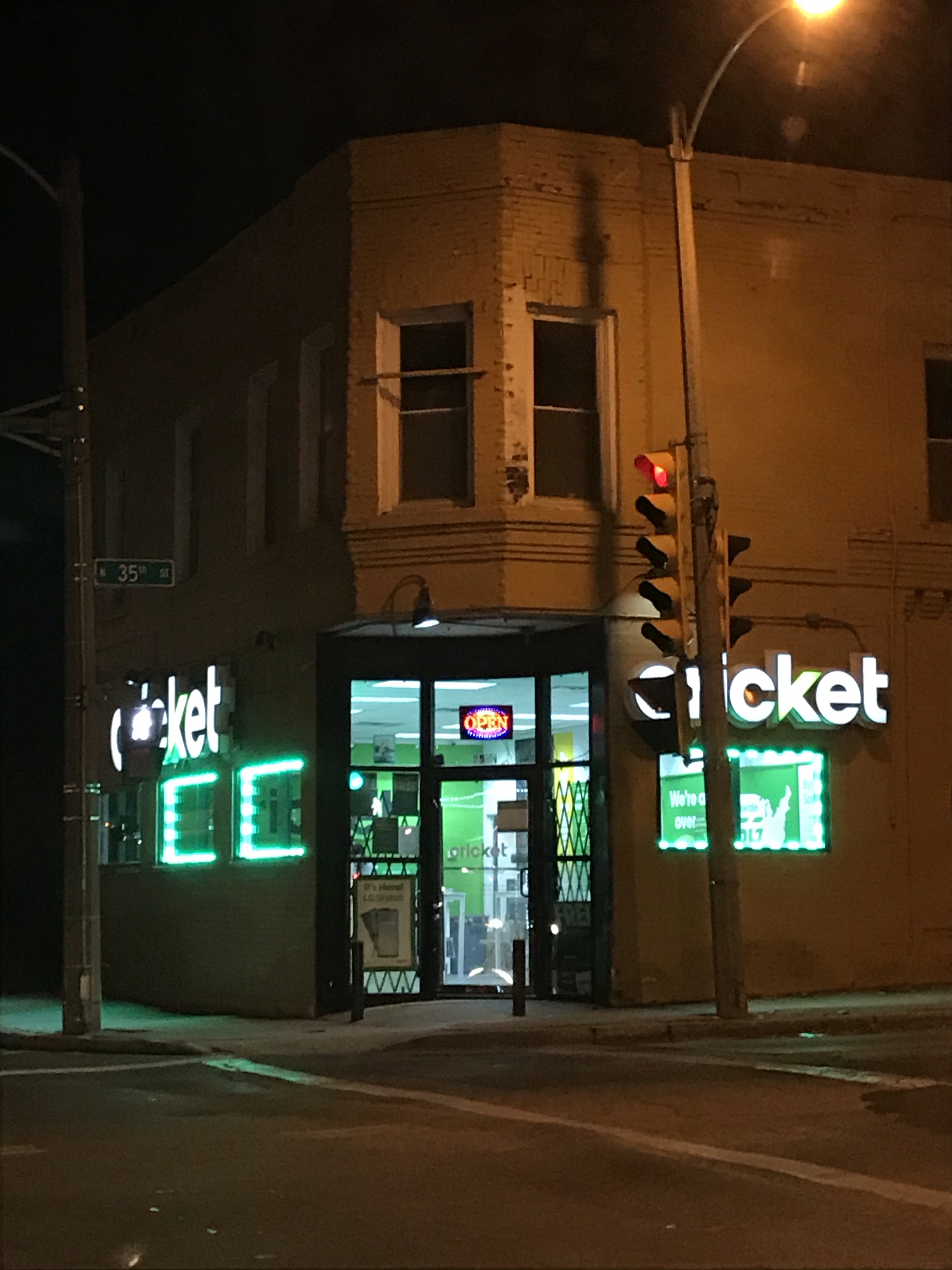 Cricket phone store at night | Katherine Wikoff